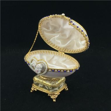 Real hand decorated carved etched goose egg music box